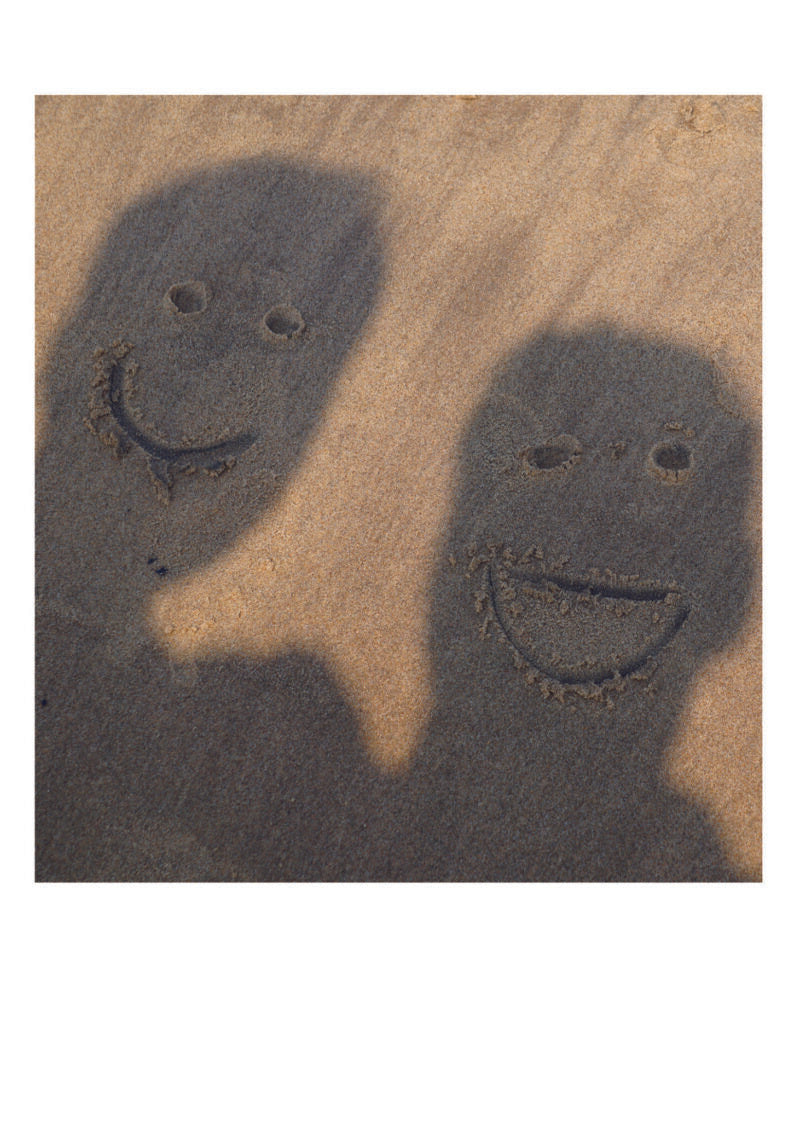 FACE SHADOWS IN SAND CARD